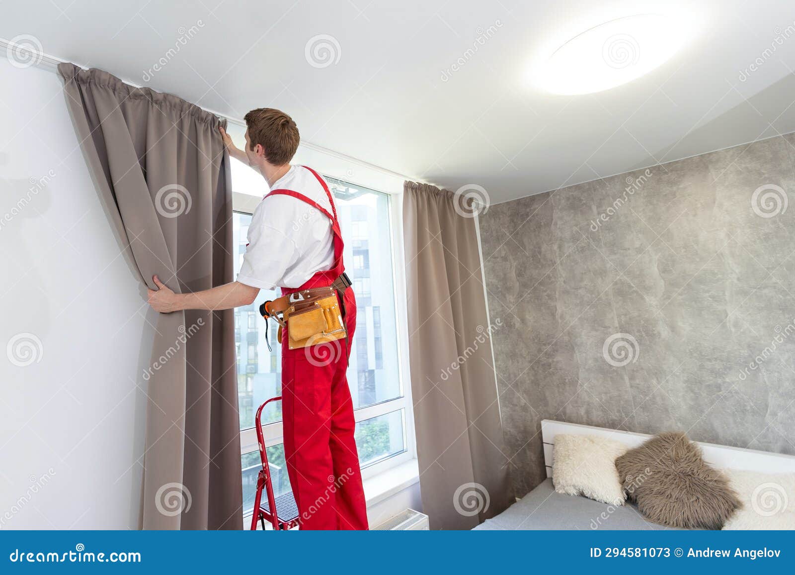 Worker Installing Window Curtain Rod on the Wall Stock Image - Image of ...