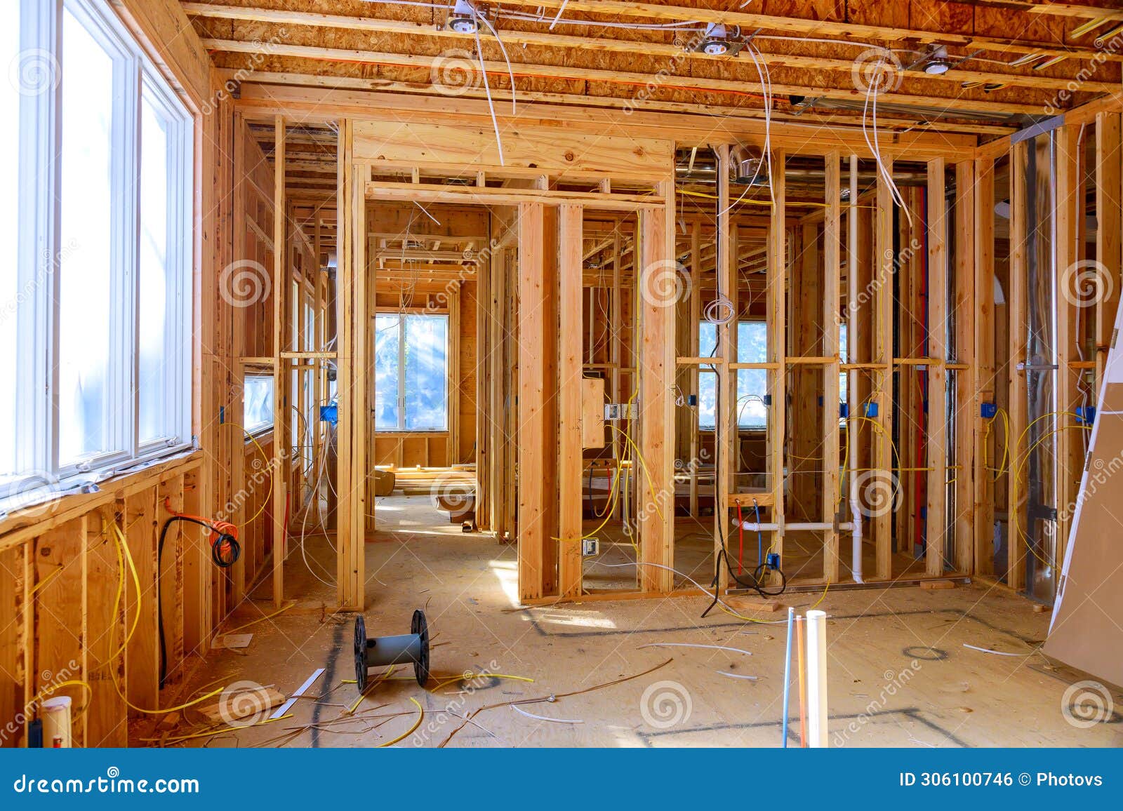 Worker Installs Electrical Wires, Insulation, and Ceiling Light before ...