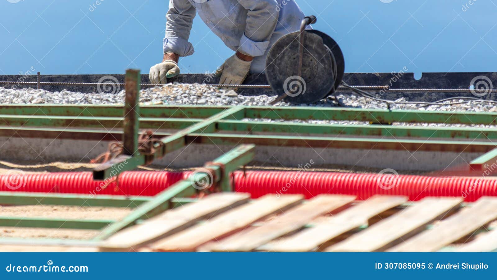 A Worker Installs Formwork at a Construction Site Stock Image - Image ...