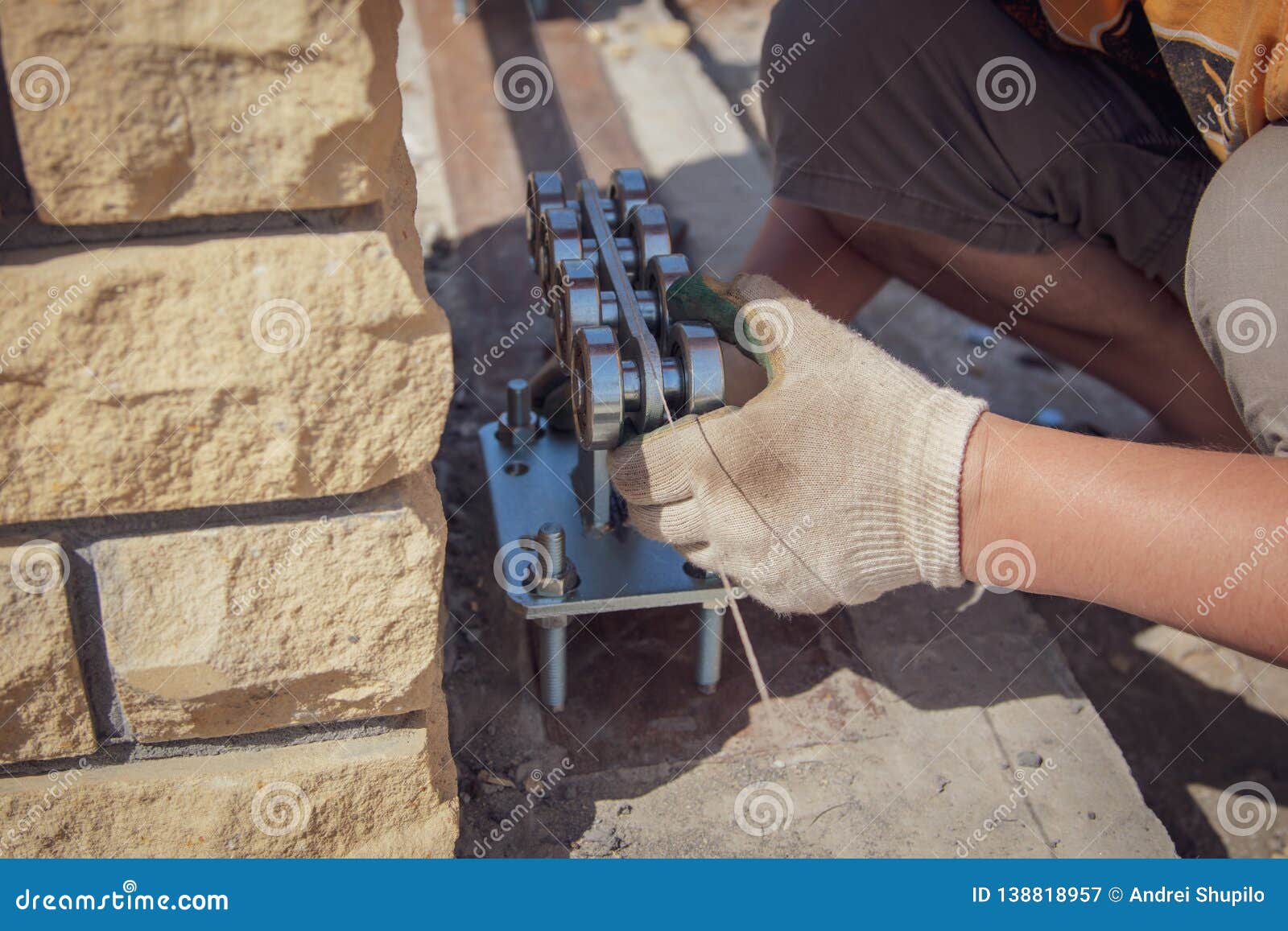 The Worker Installs Rollers on the Sliding Gate Stock Image - Image of ...