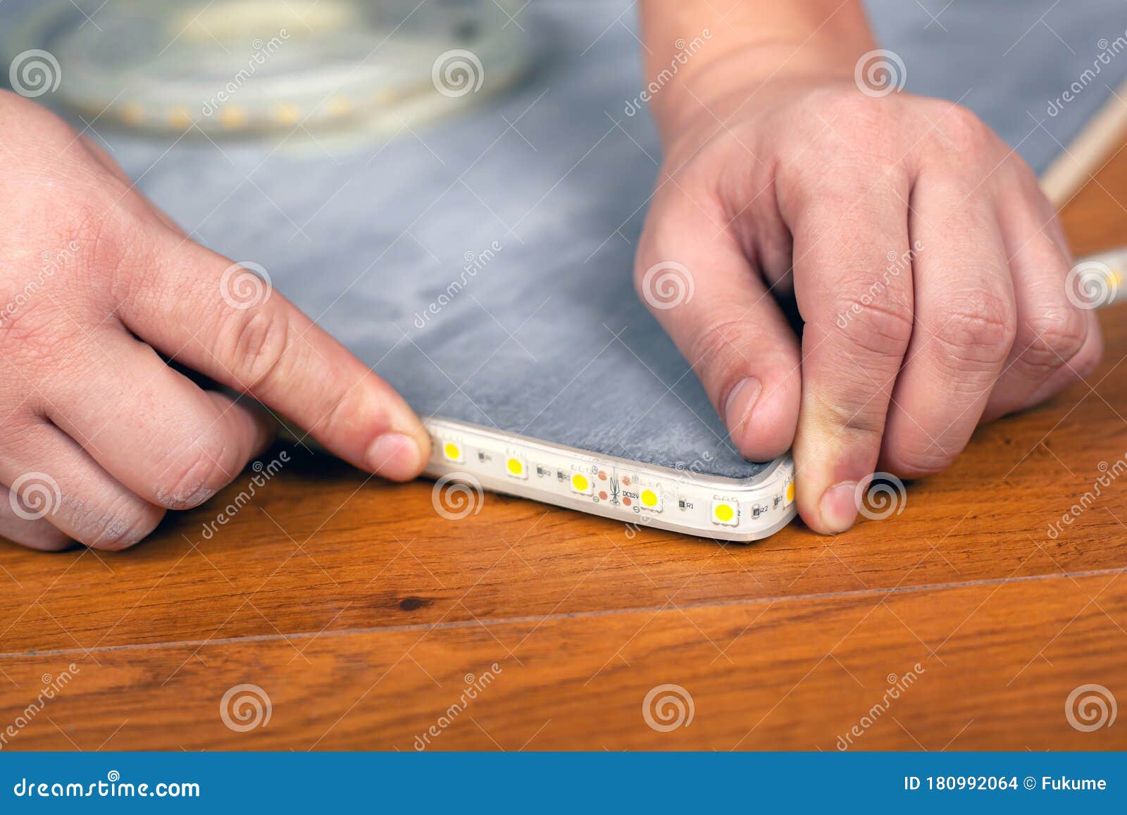 Worker Installs Strip LED Lighting. Installation of Decorative Diode ...