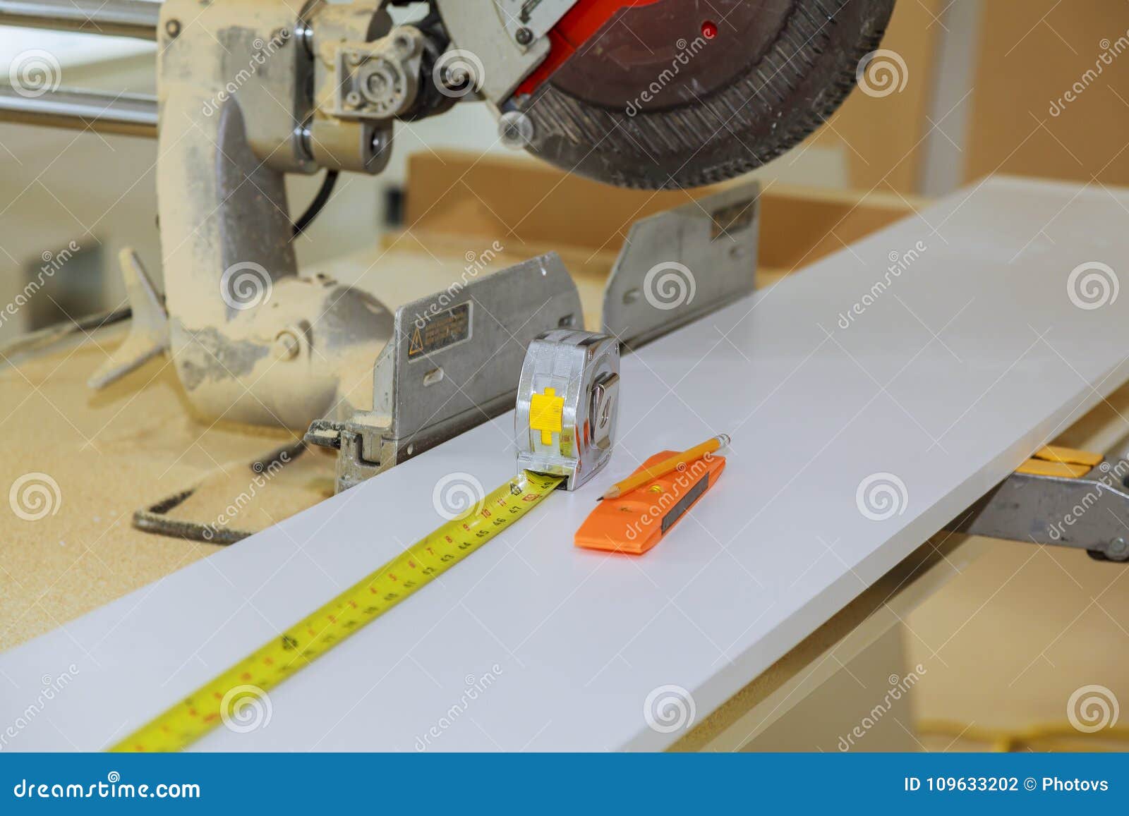 Worker Installs Tiles on the Floor. he Put Glue Using Comb Trowel ...