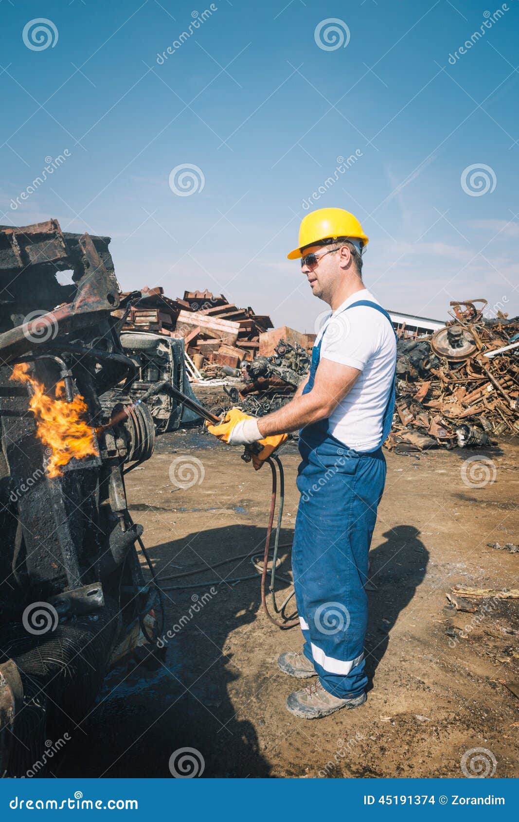Worker in a junkyard stock photo. Image of garbage, rust - 45191374