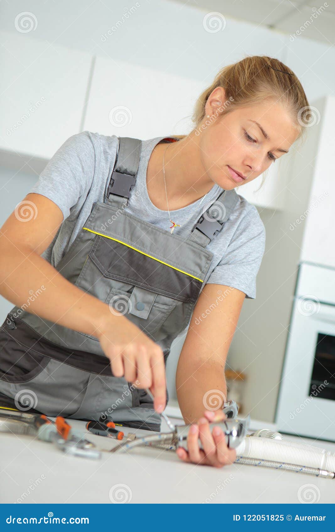 Worker in the kitchen stock image. Image of plumber - 122051825