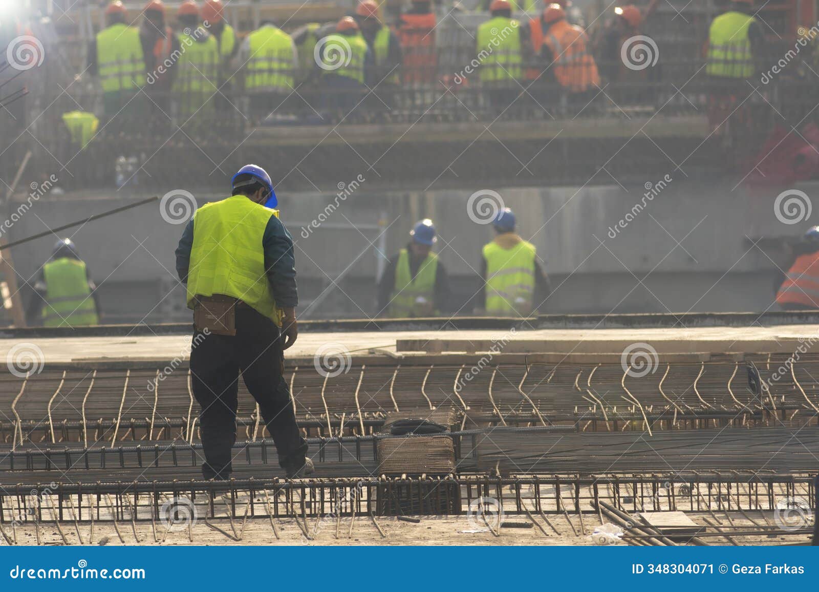 Worker Knitting Metal Rods Bars into Framework Reinforcement for ...