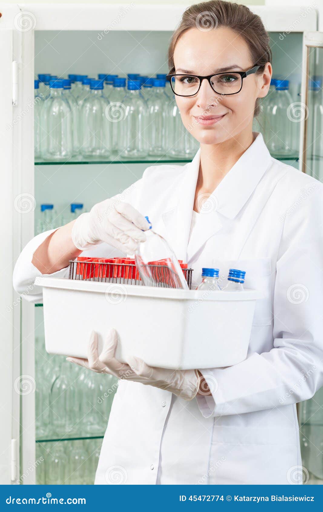 Worker of lab holding box stock photo. Image of professional - 45472774