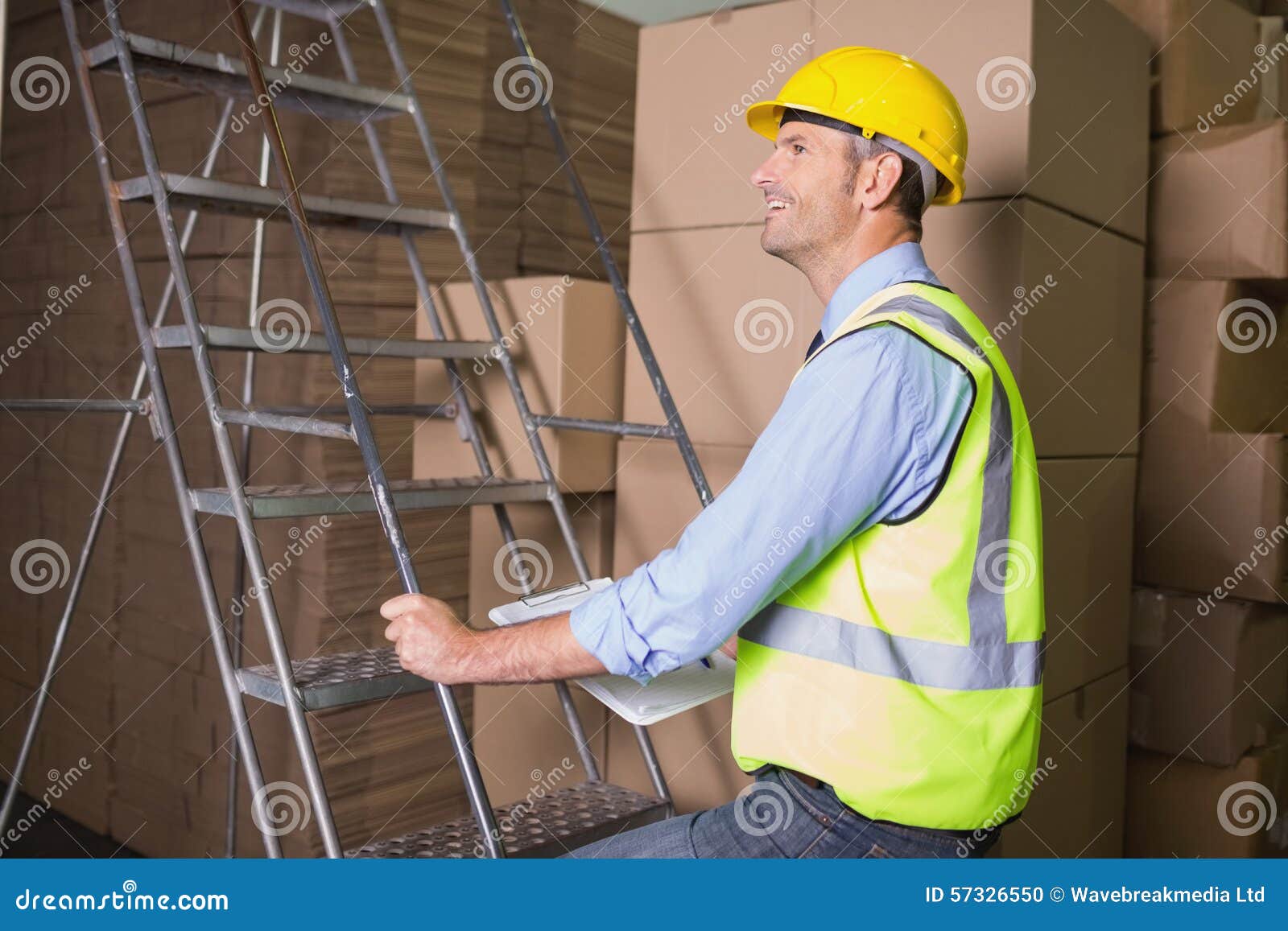 Worker on Ladder in Warehouse Stock Photo - Image of caucasian ...