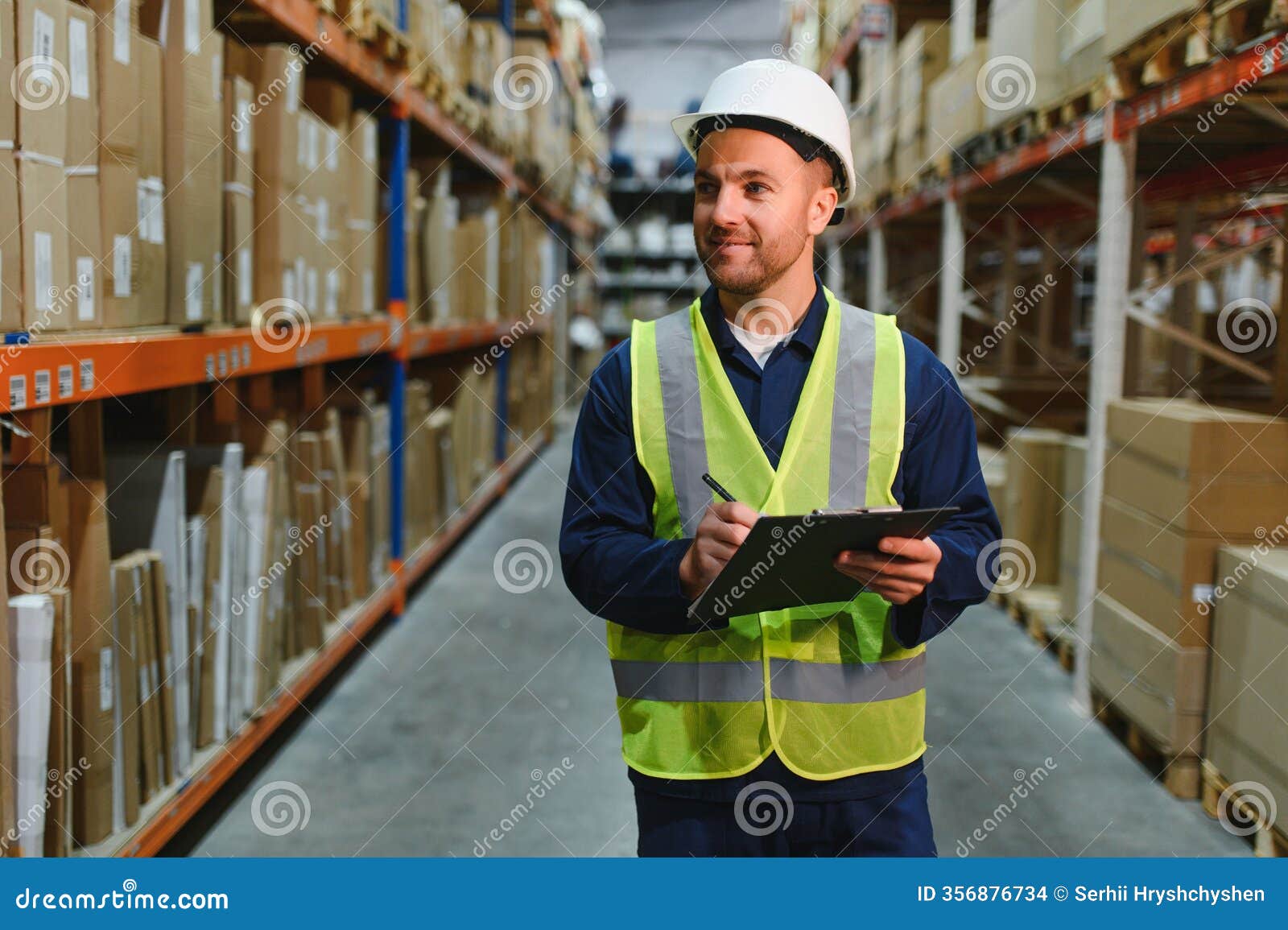 Worker with Laptop Computer in Mail Order Warehouse Stock Photo - Image ...