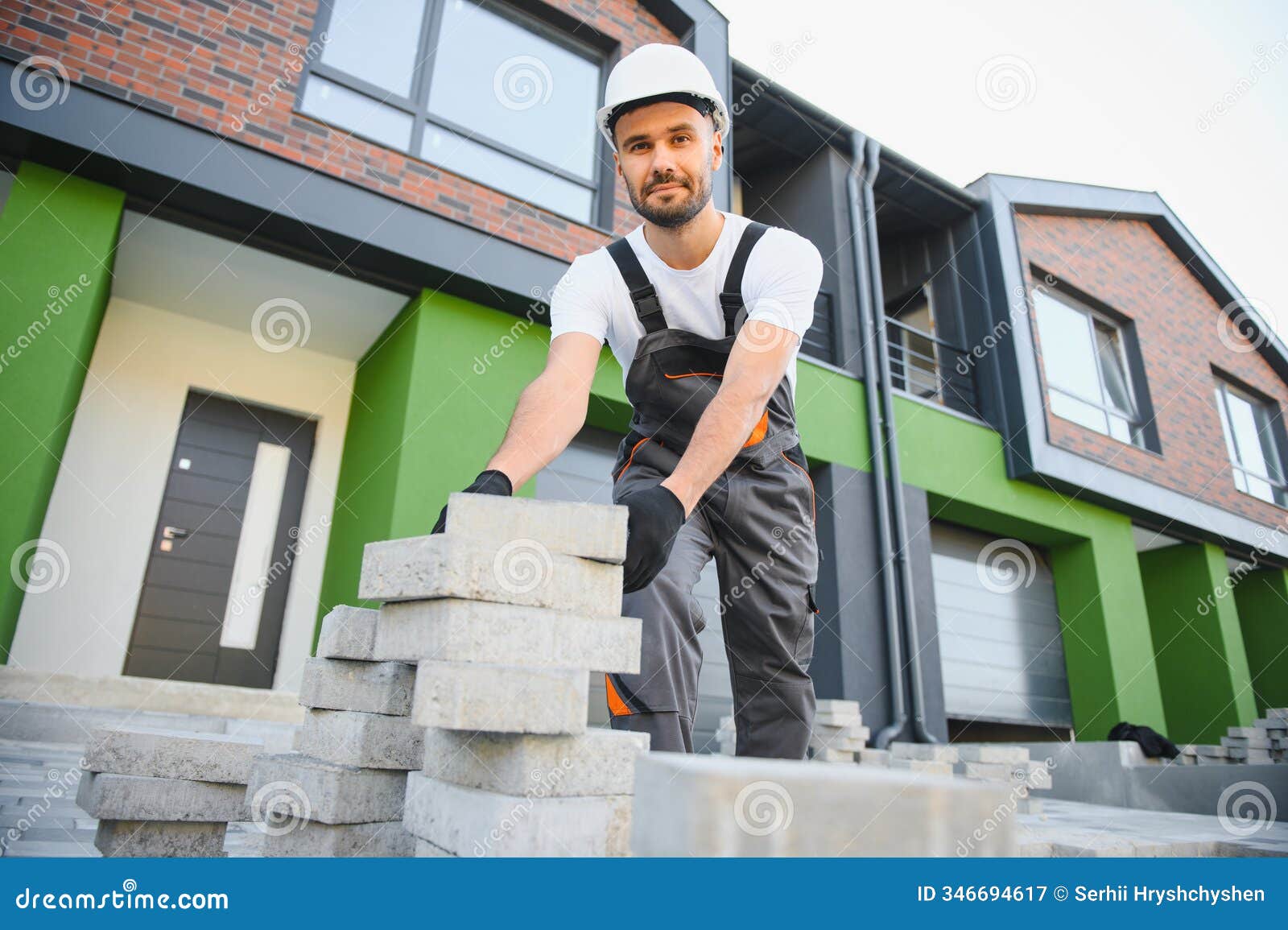 Worker Lay Paving Tiles, Construction of Brick Pavement, Men S Hands in ...