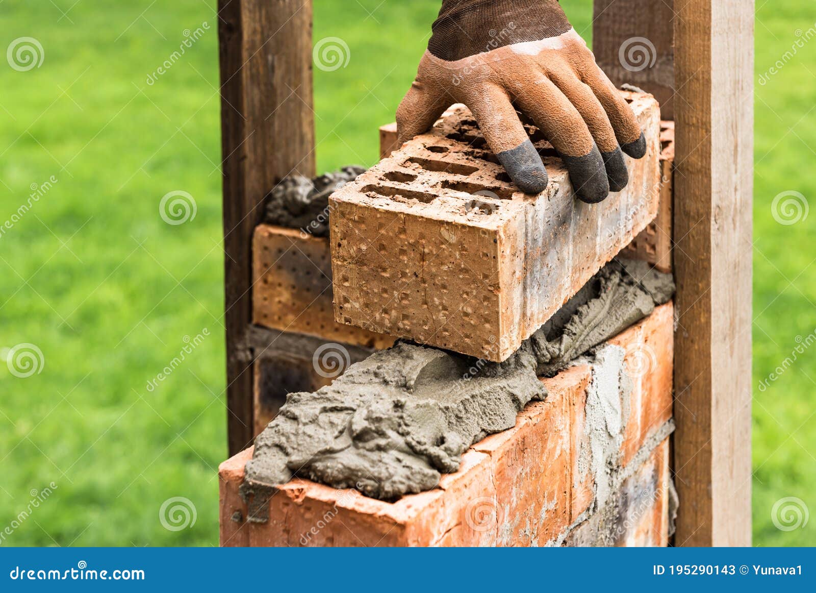 A Worker is Laying a Brick Wall Stock Image - Image of concrete ...