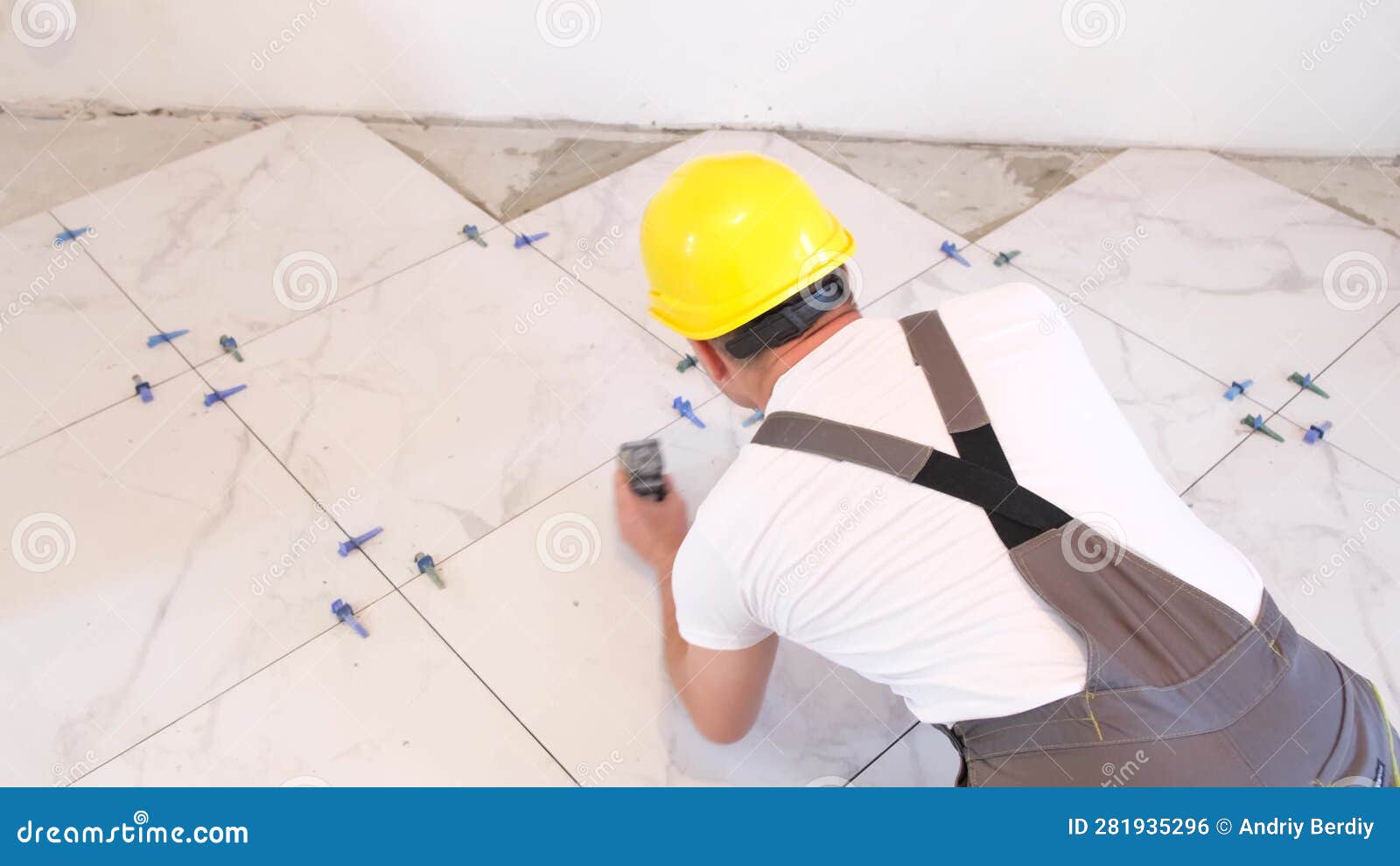 A Worker Laying Large Wide-format Floor Tiles. Stock Footage - Video of ...