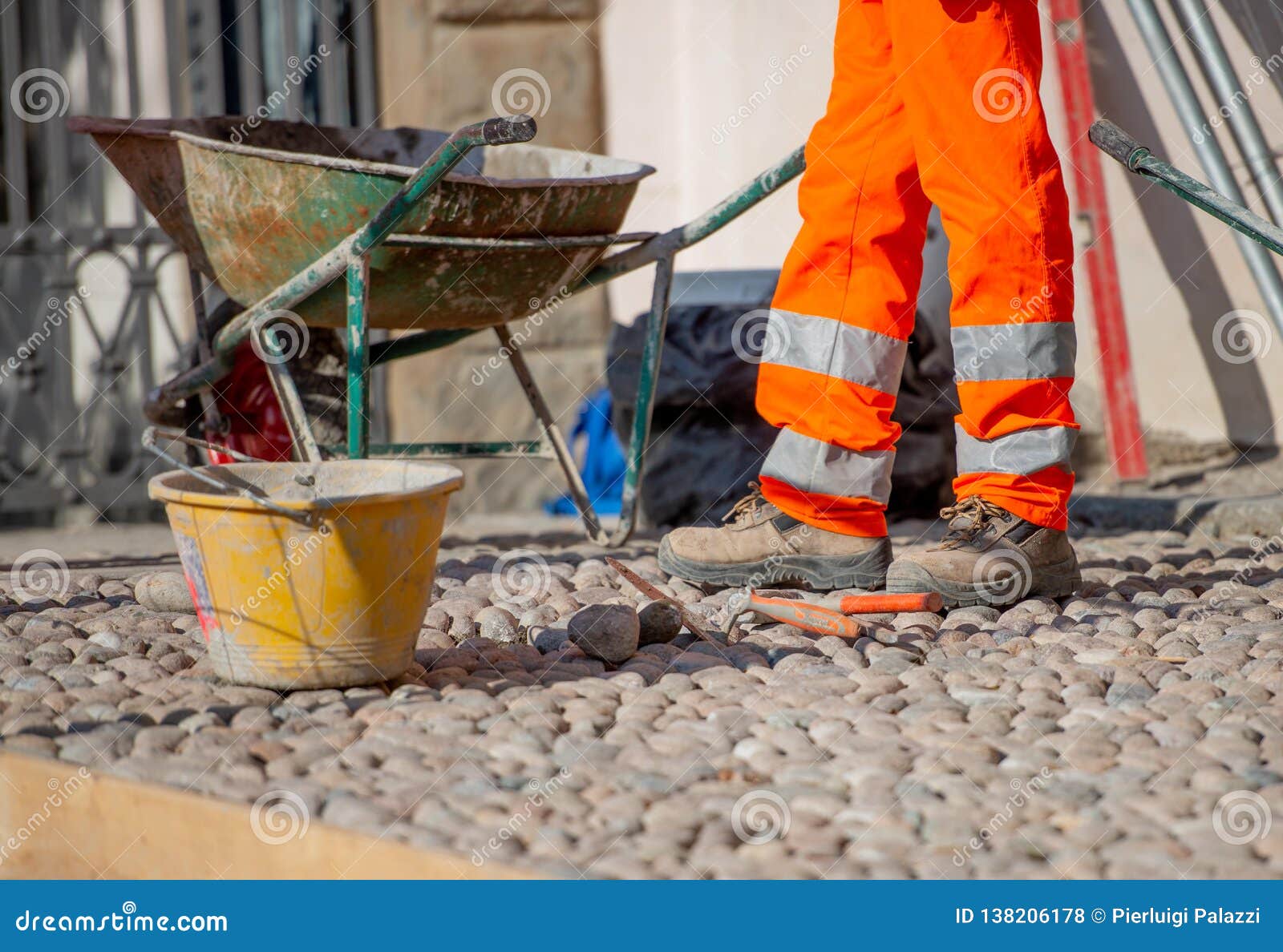 Laying of Cobblestone Flooring Stock Photo - Image of manual, pebbles ...
