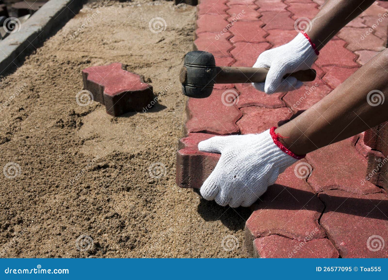 Worker Laying Red Concrete Paving Blocks. Stock Image - Image of ...
