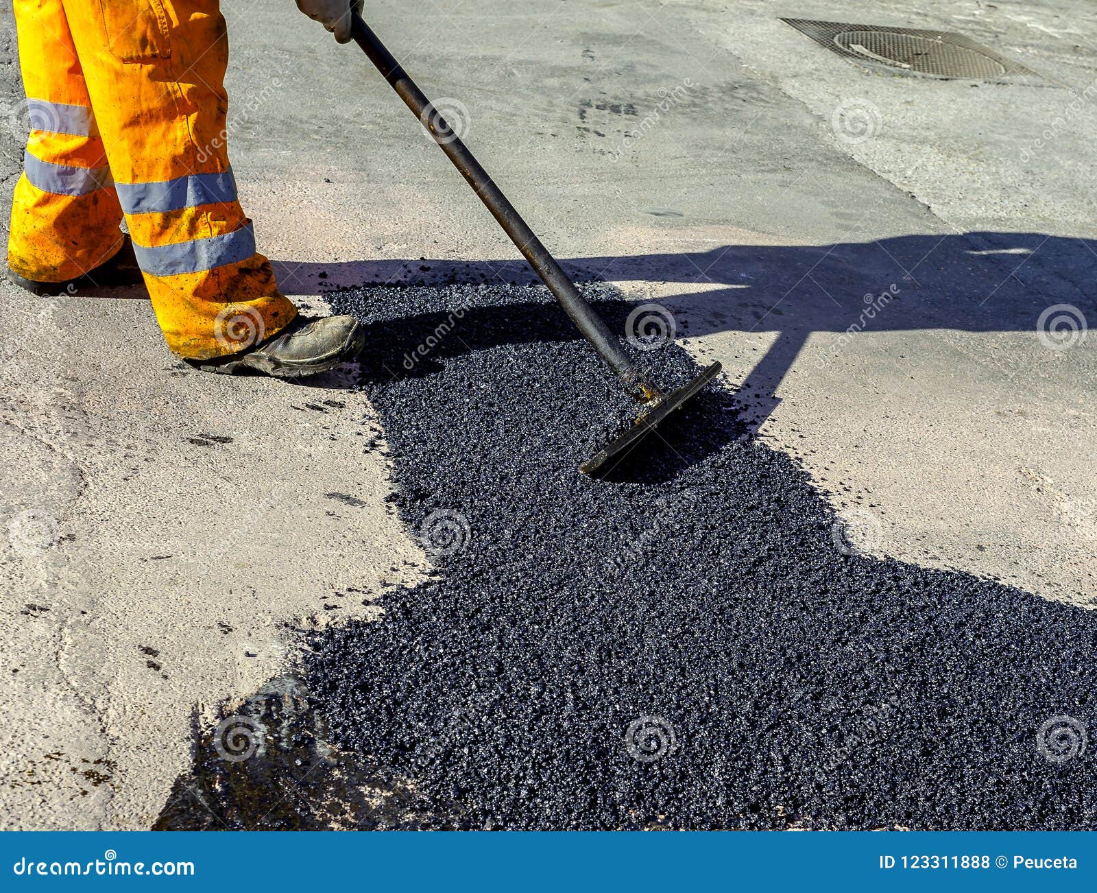 Worker Leveling With Wooden Trowel The Fresh Poured Concrete Or Cement ...