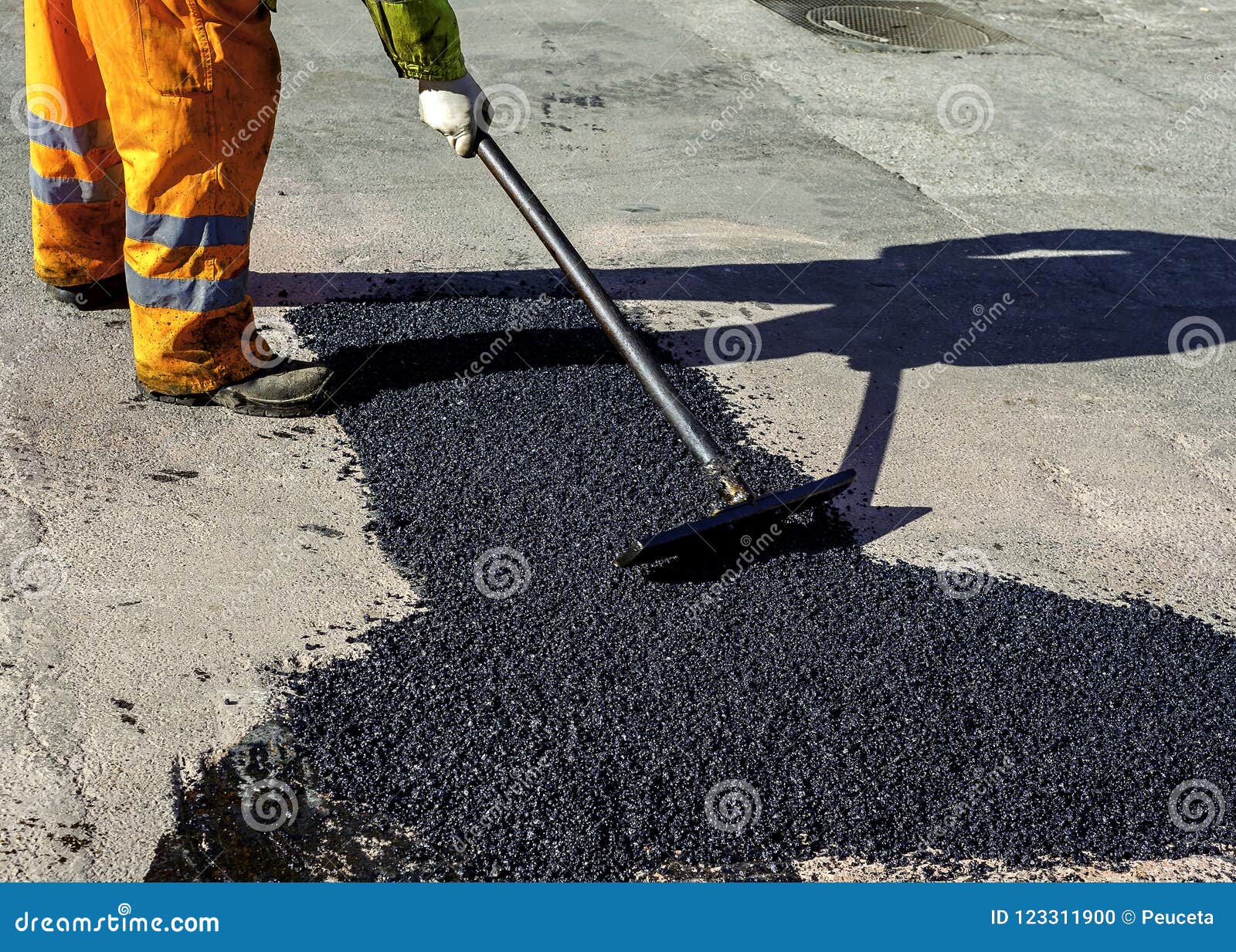 Worker Leveling Fresh Asphal Stock Photo - Image of industry, machine ...
