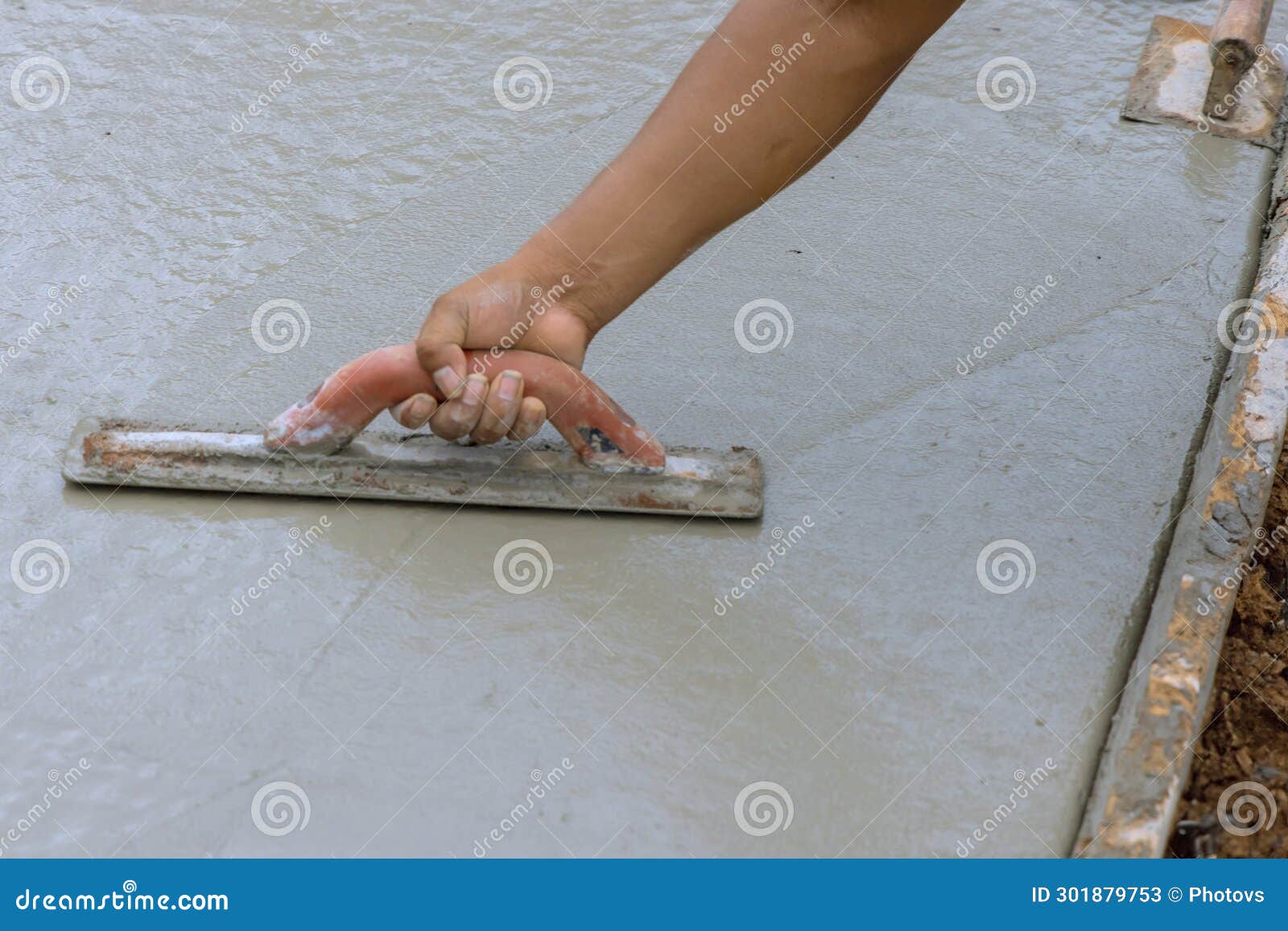 Worker Leveling Fresh Concrete Pavement with Wet Cement Using a Special ...