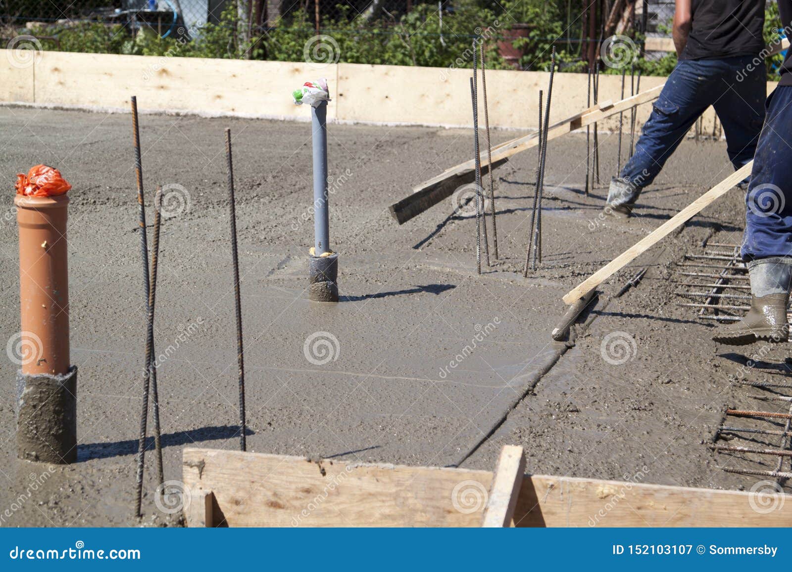 Worker Leveling Fresh Concrete Slab with a Special Working Tool Stock ...
