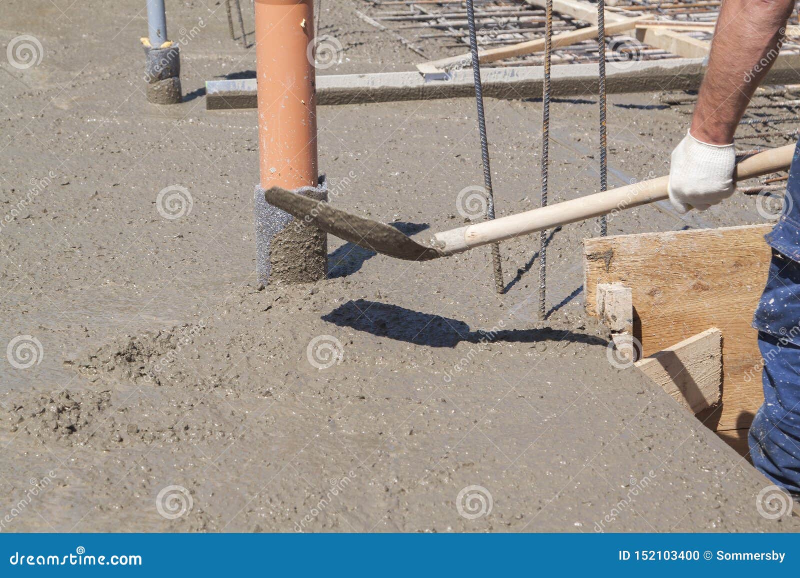 Worker Leveling Fresh Concrete Slab with a Special Working Tool Stock ...