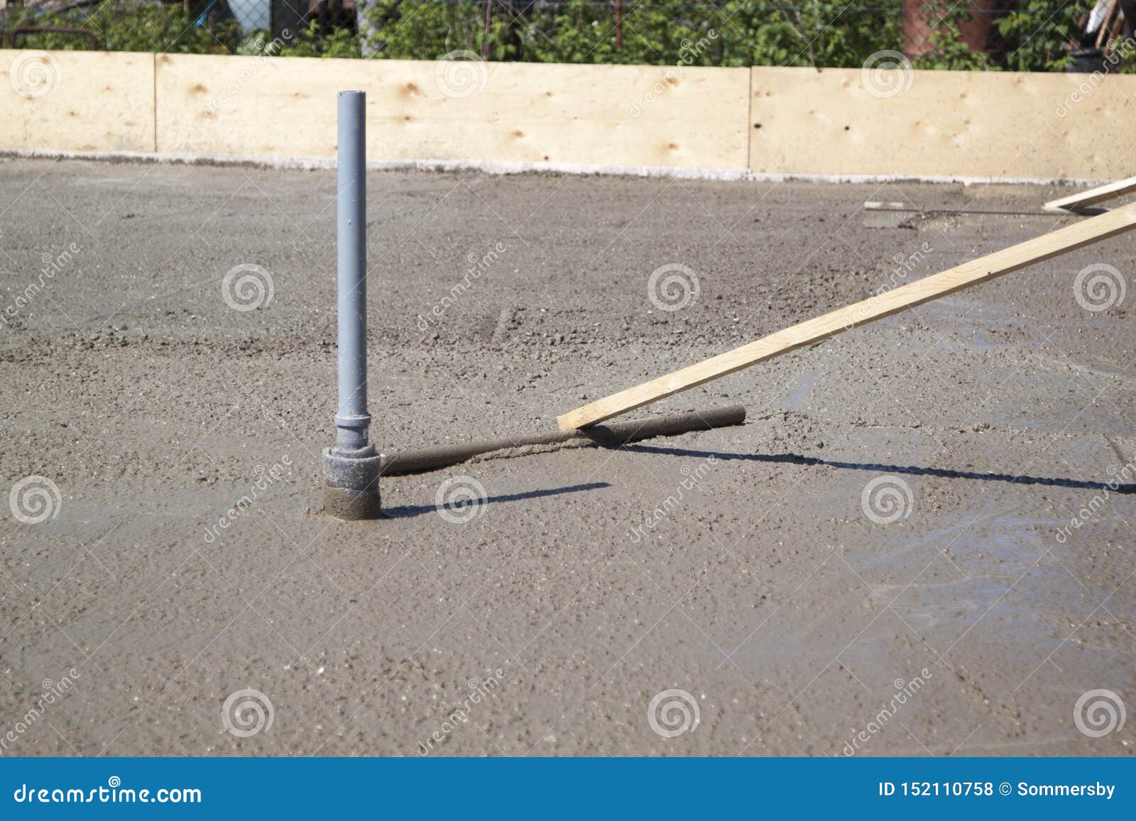 Worker Leveling Fresh Concrete Slab with a Special Working Tool Stock ...