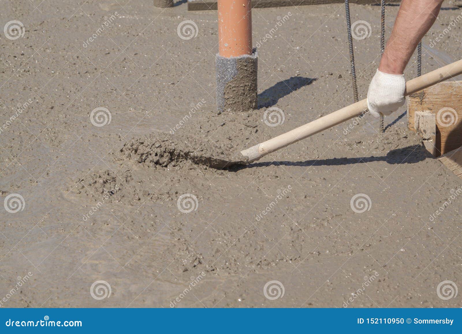 Worker Leveling Fresh Concrete Slab with a Special Working Tool Stock ...
