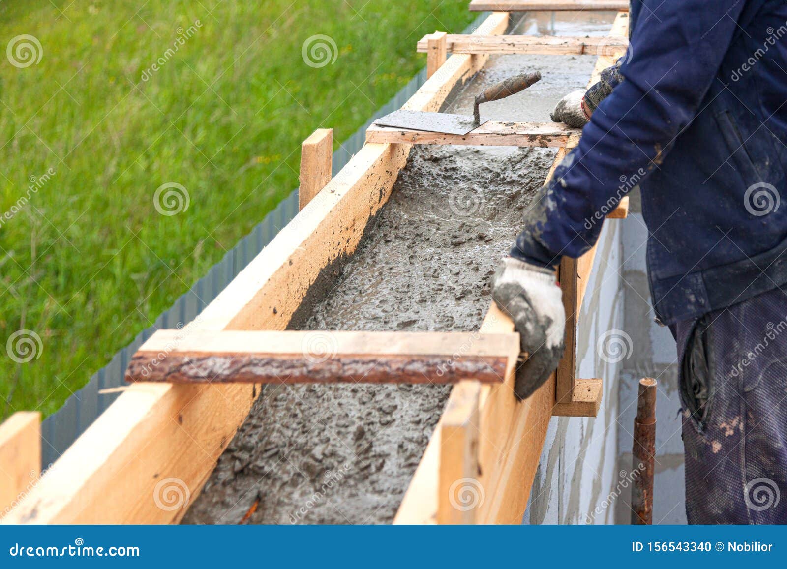 Worker Levels Concrete in Formwork Stock Photo - Image of construction ...