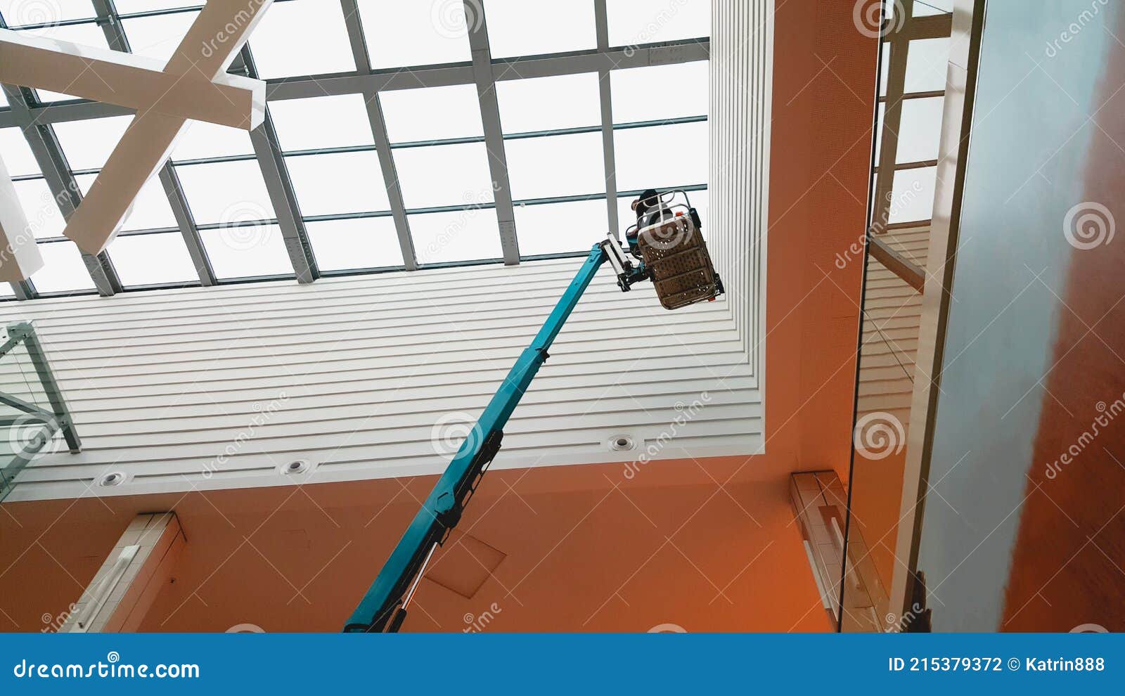 Worker in lift bucket stock photo. Image of height, hydraulic - 215379372