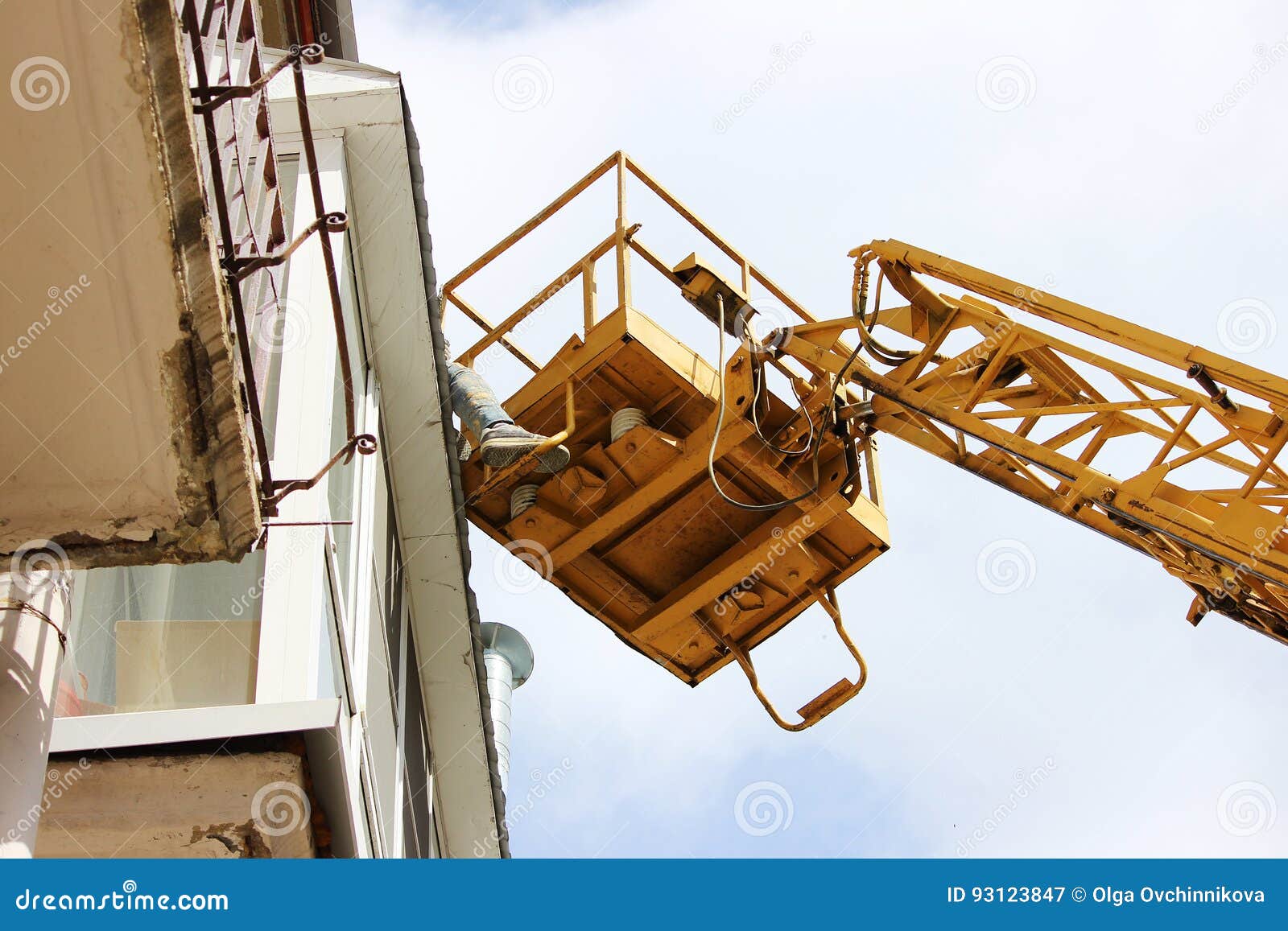 Worker on a Lift during a House Renovation. Stock Image - Image of lift ...