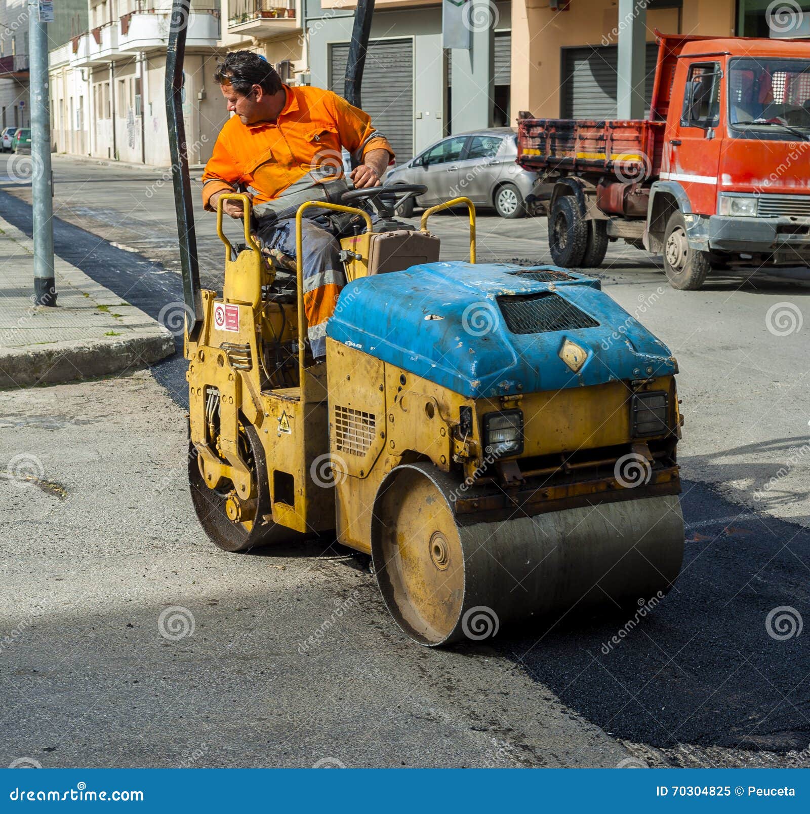 Worker on Light Vibration Roller Compactor Stock Image - Image of ...