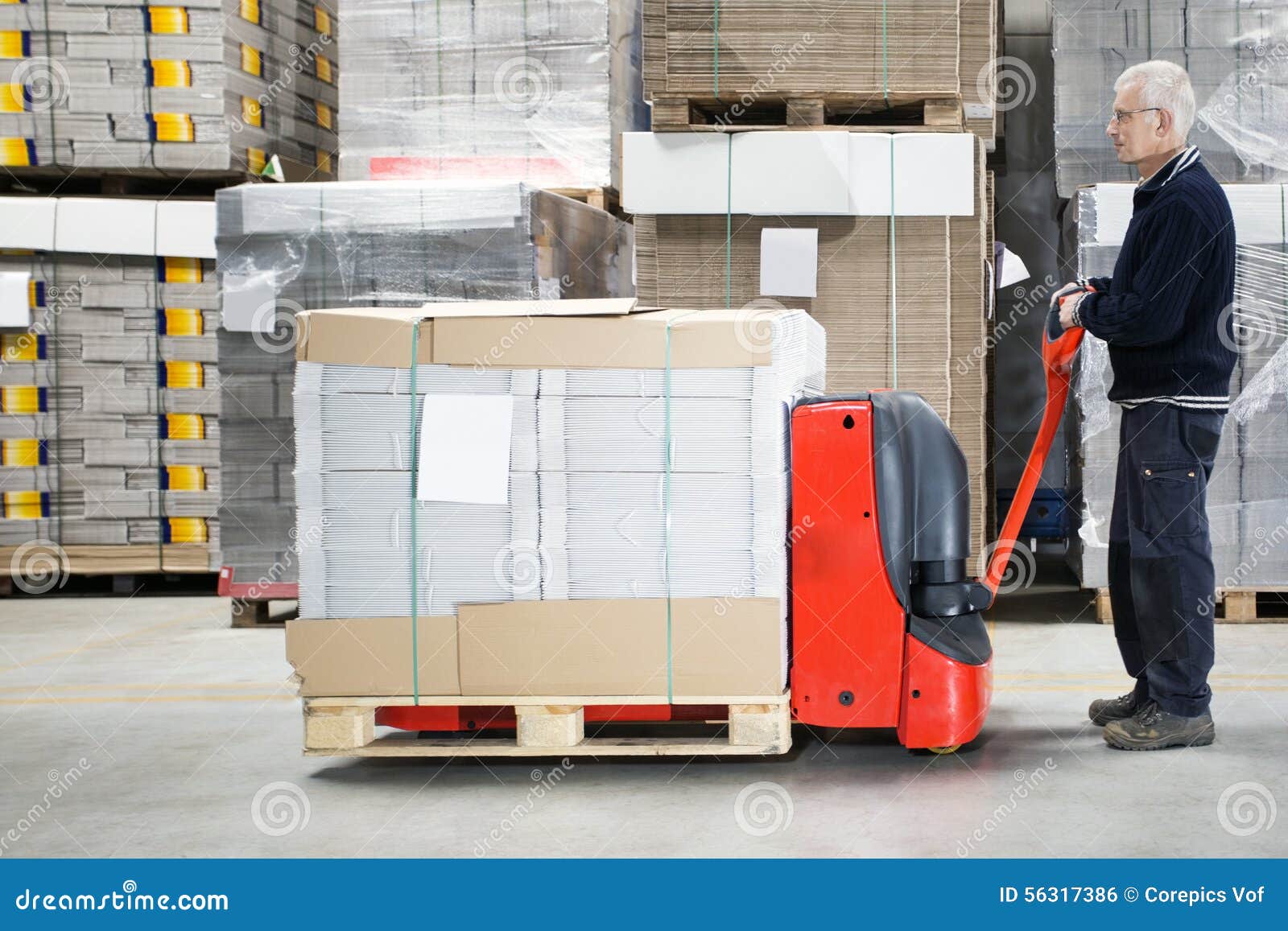 Worker with Loaded Handtruck in Warehouse Stock Photo - Image of worker ...