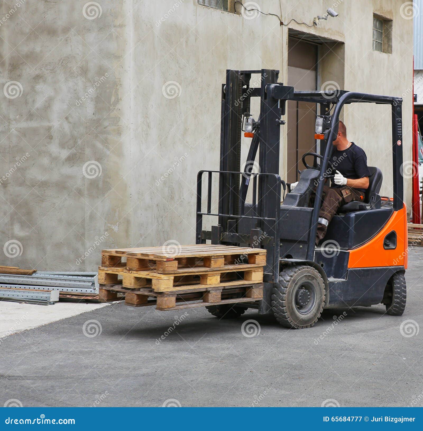 Worker on loader stock image. Image of depot, freight - 65684777