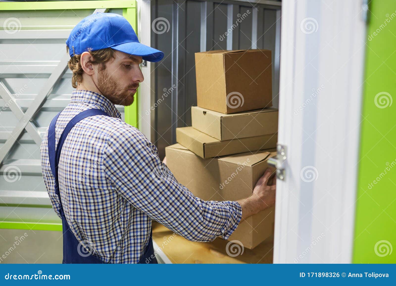 Worker Loading Boxes into Stockroom Stock Photo - Image of industry ...