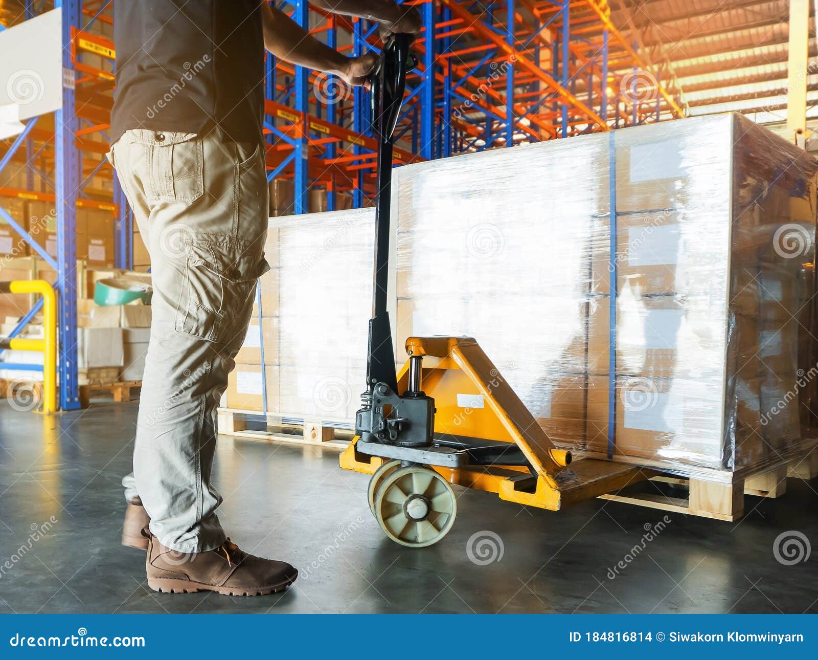 Worker Loading Cargo Shipment Pallet Goods at Warehouse Storage. Stock ...