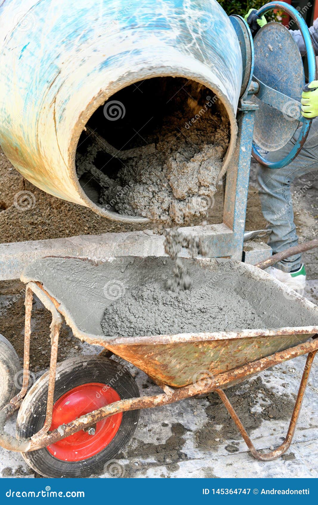 Worker Loading Cement into Wheelbarrow Stock Image - Image of pouring ...