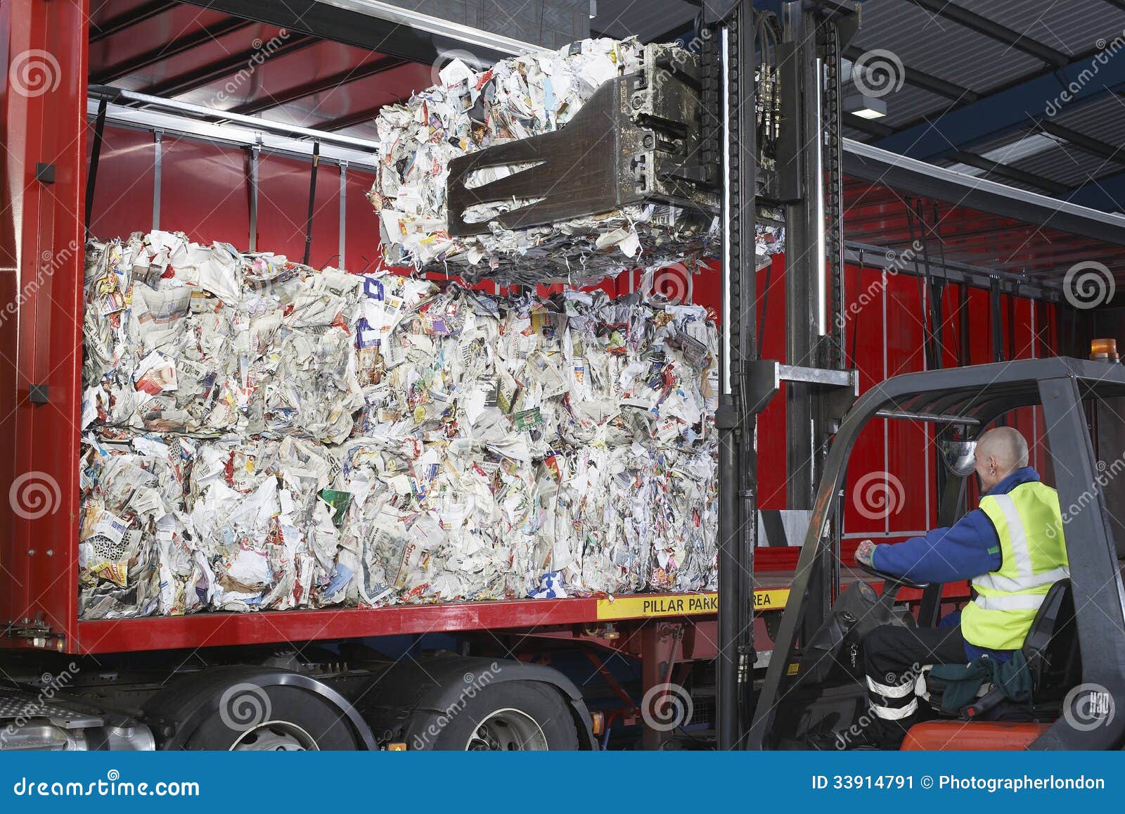 Worker Loading Stacks of Recycled Papers on To Lorry Stock Image ...