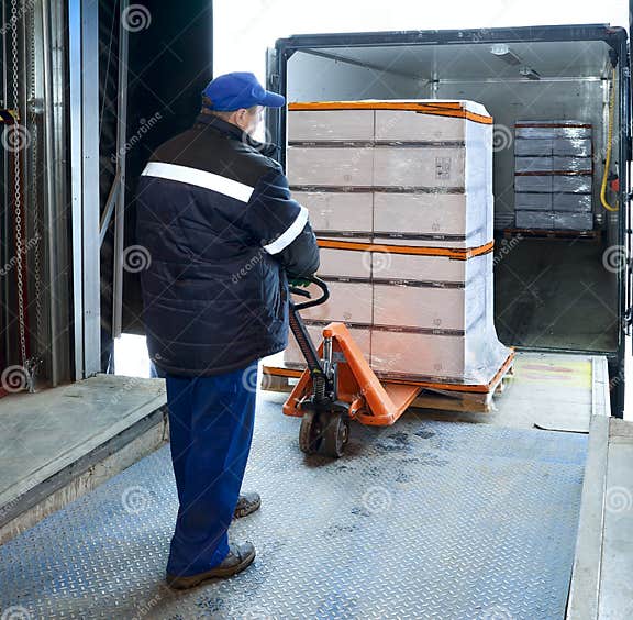Worker loading on truck stock image. Image of male, stacking - 39676787