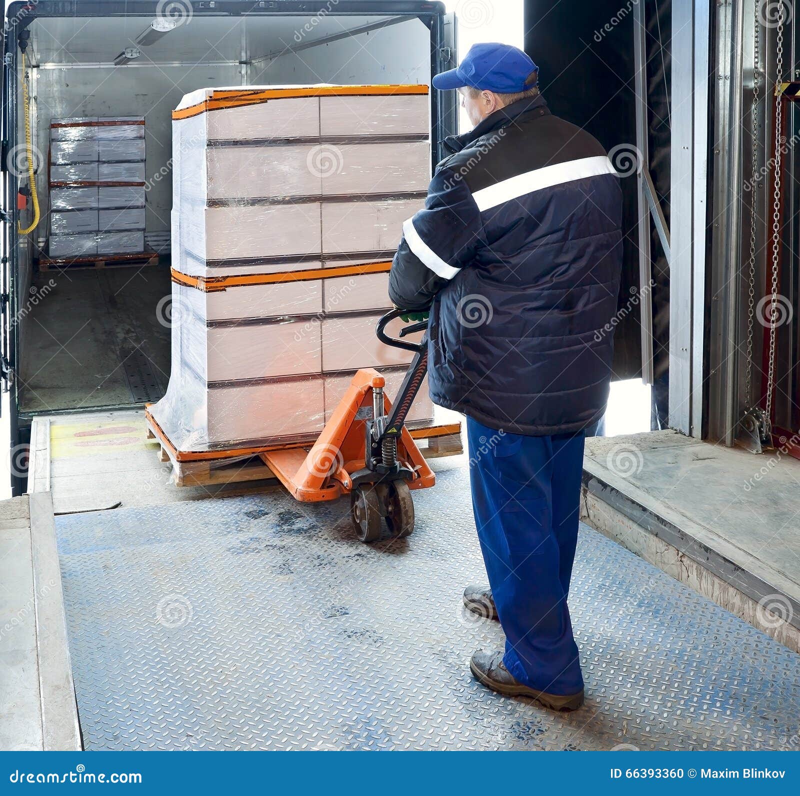 Worker loading on truck stock photo. Image of occupation - 66393360