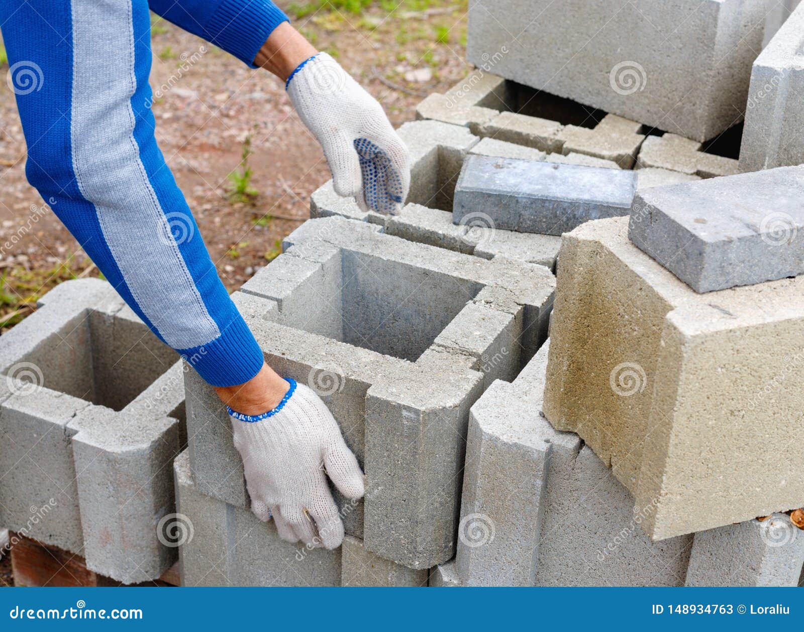 Worker Loads Cinder Blocks from Cement Slurry for Construction Stock ...
