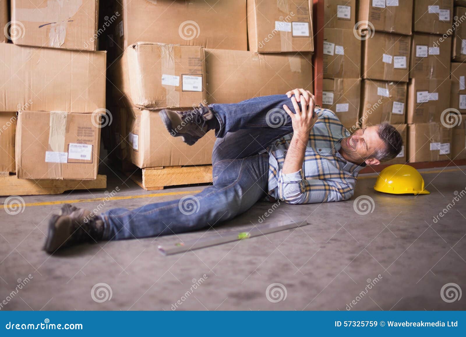 Worker Lying on the Floor in Warehouse Stock Image - Image of lying ...