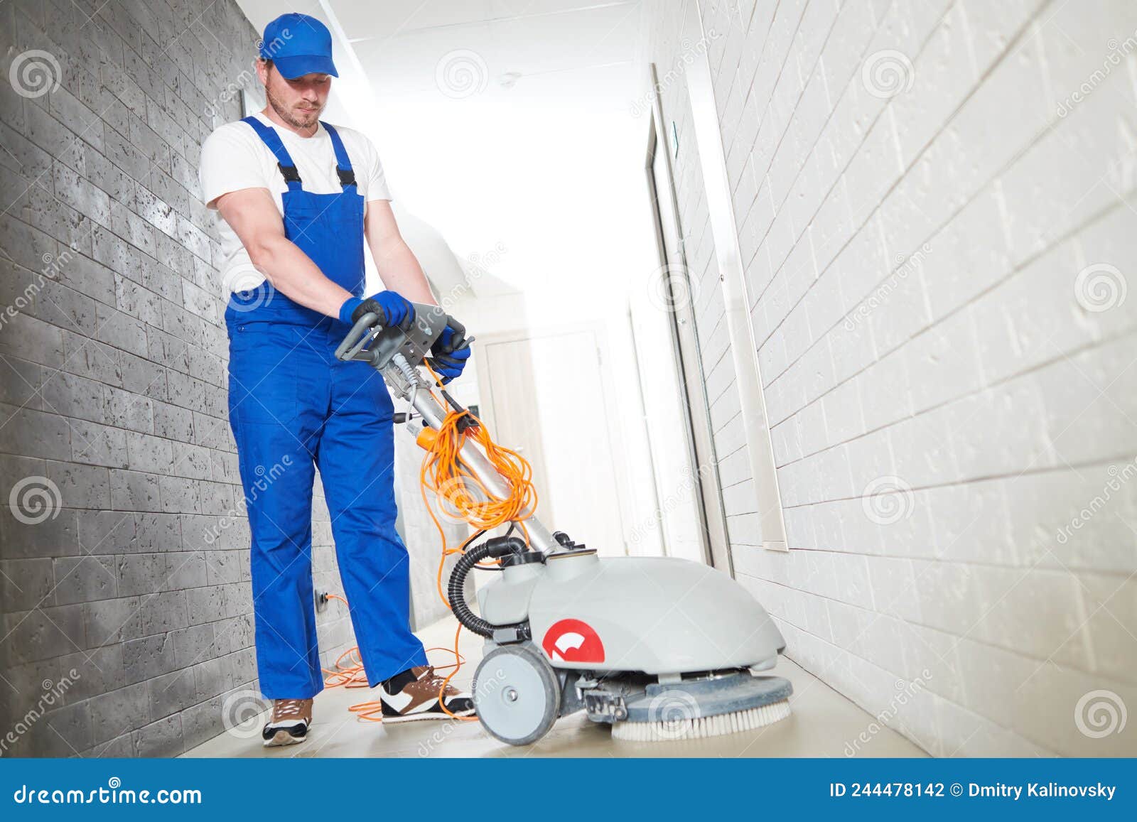 Worker with Machine Cleaning Floor in Residence Hall Stock Photo ...