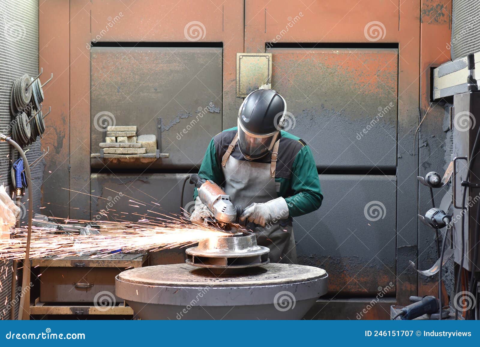 Worker Machined Workpiece Casting with a Grinding Machine - Work Safety ...