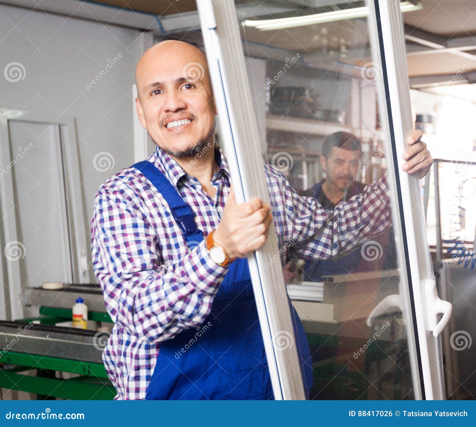 Worker Makes the Finished Door Stock Photo - Image of polymer ...