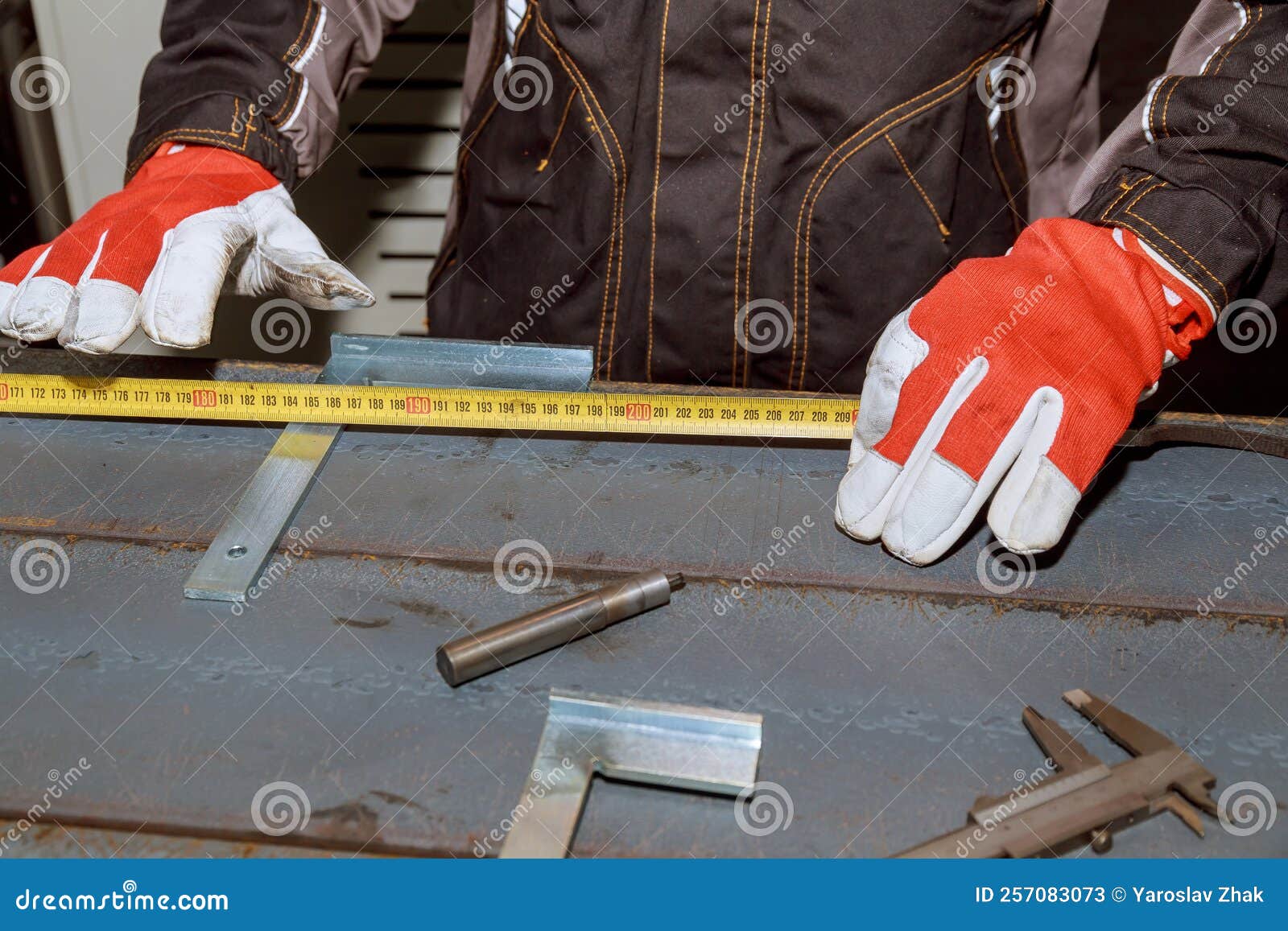 The Worker Makes a Mark on a Metal Surface by Means of Measuring Square ...
