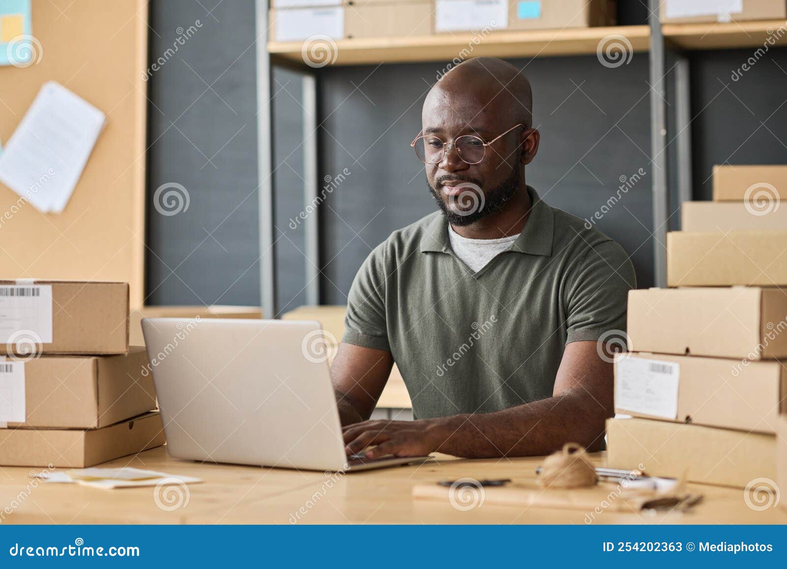 Worker Making Delivery Online on Laptop Stock Image - Image of typing ...
