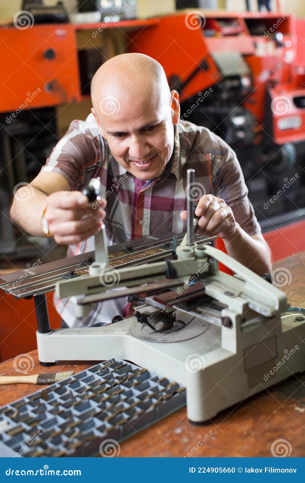 Worker making nameboard stock photo. Image of making - 224905660