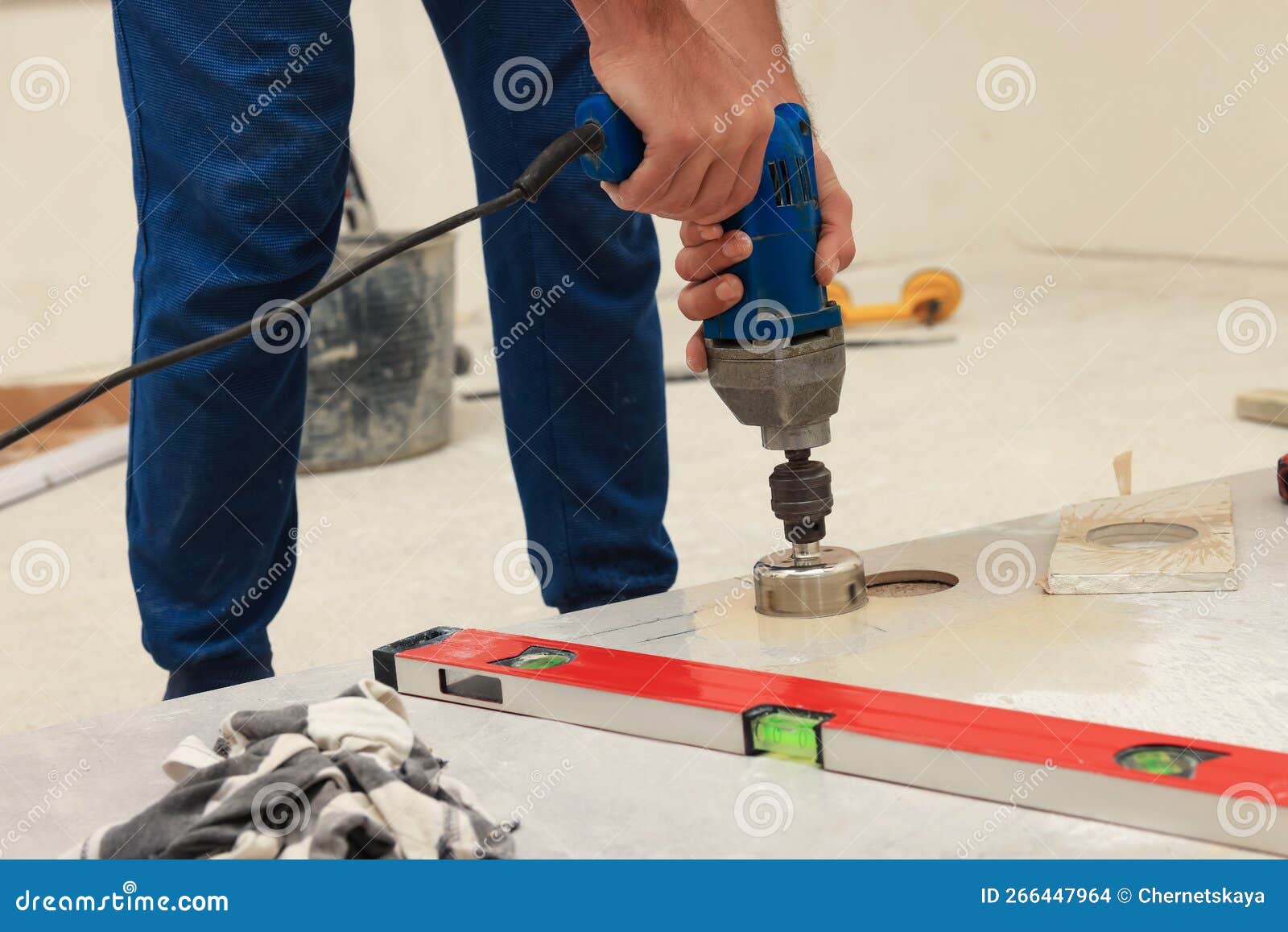 Worker Making Socket Hole in Tile Indoors, Closeup Stock Photo - Image ...