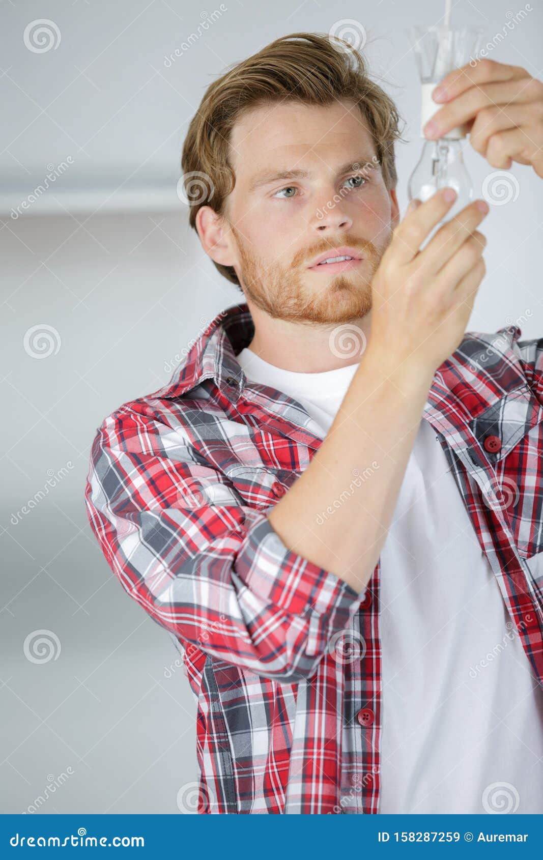 Worker Man Changing Light Bulb Stock Image - Image of style, exchange ...