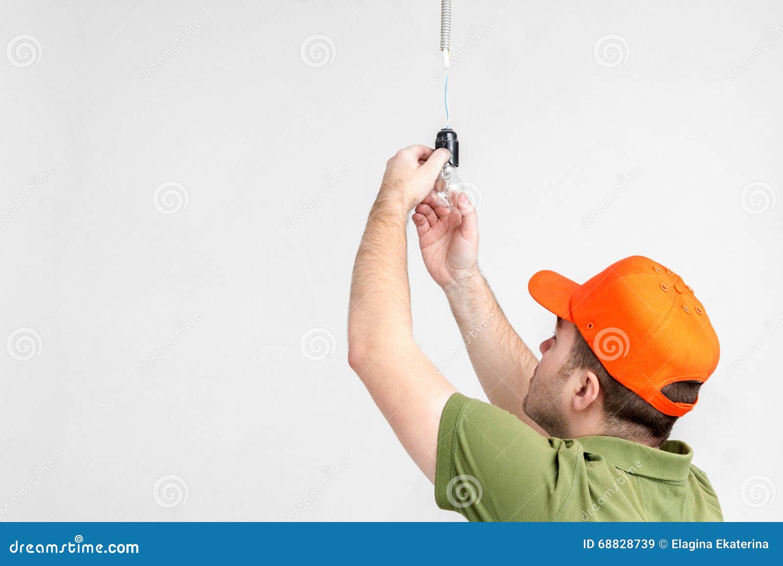 Worker Man Changing Light Bulb Stock Image - Image of male, face: 68828739