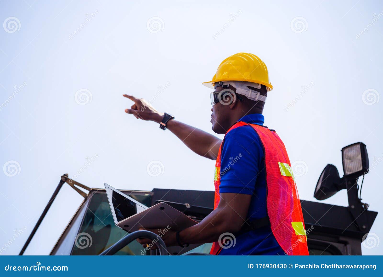 Worker Man in Hardhat and Safety Vest Holding Laptop Standing on ...
