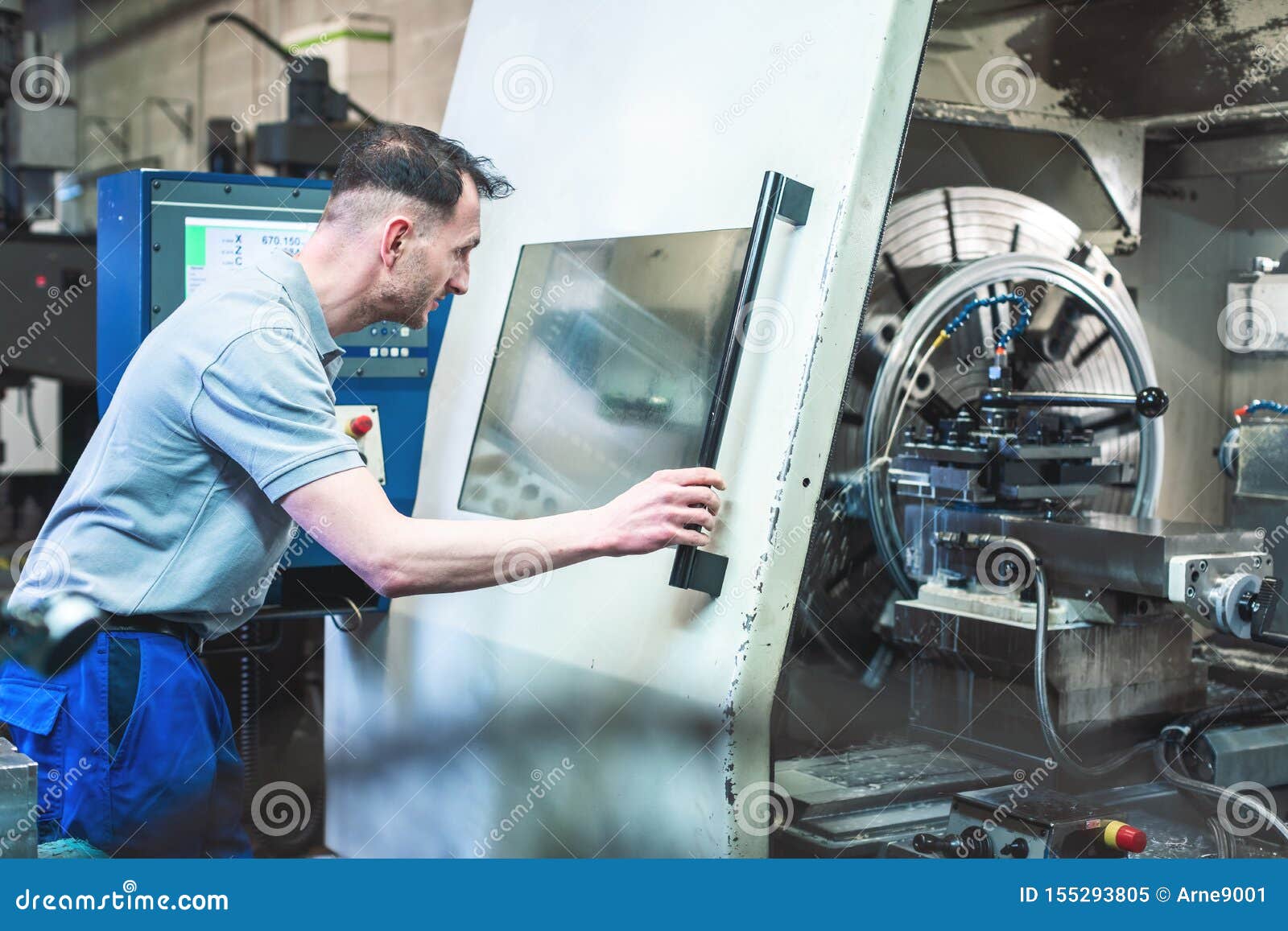 Worker Operating a CNC Lathe in Factory Stock Image - Image of skilled ...