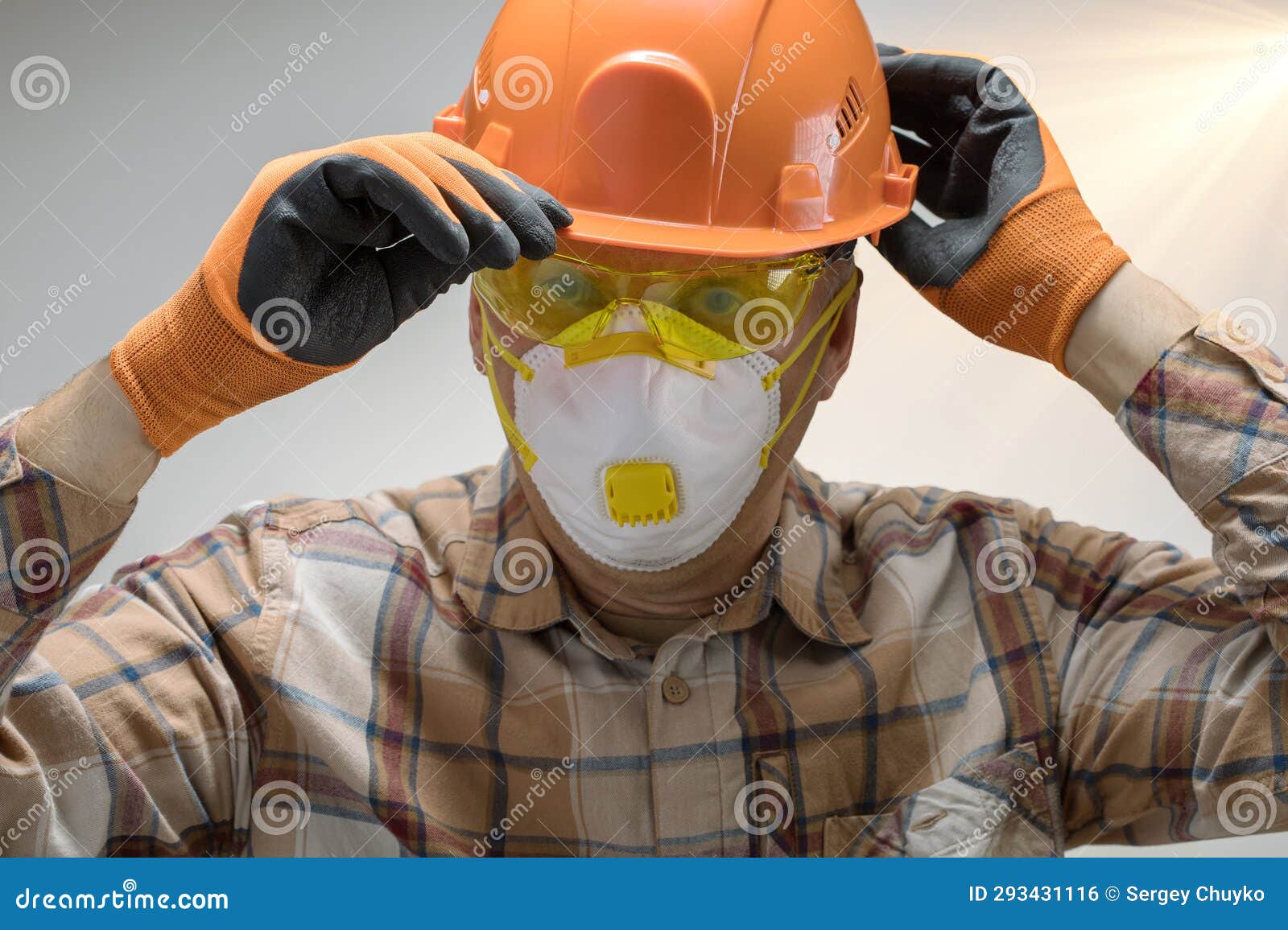 Worker Man Putting His Helmet on Head. Stock Photo - Image of ...